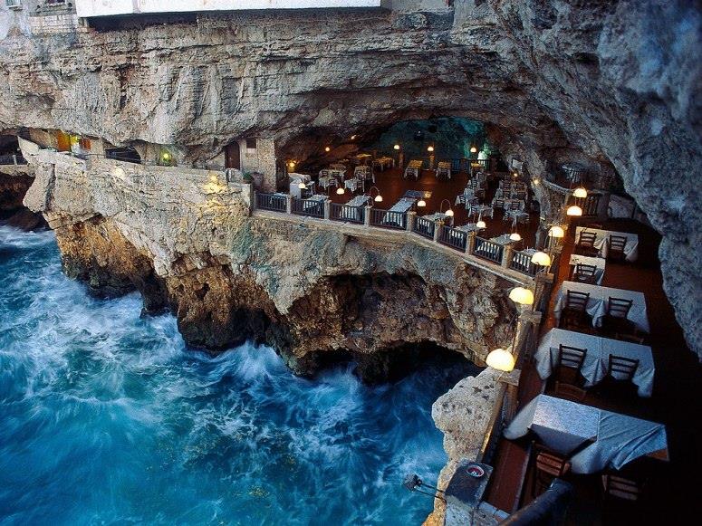 An Italian restaurant built into an ocean side grotto