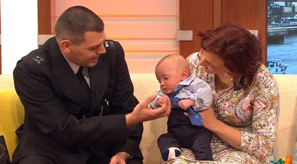 'I Grabbed Him And Ran': Hero Cop Saves Baby's Life By Running With Him To The Hospital