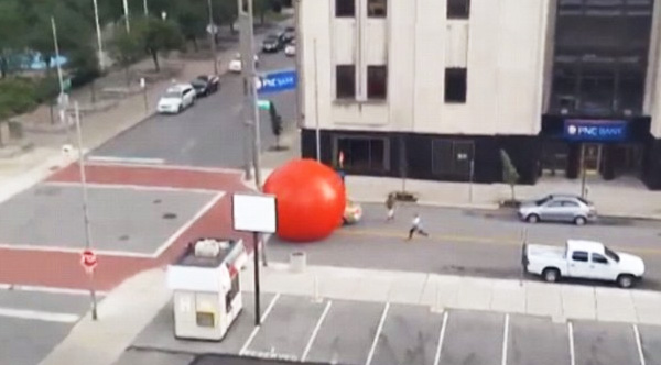 WATCH: A Giant Red Ball From An Art Installation Broke Free, Rolled ...