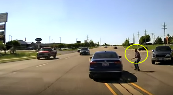 Man Dives Into Moving Car To Save Driver